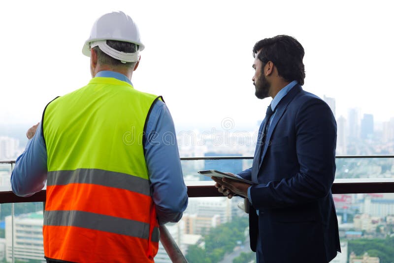 Project Planing between Engineer Foreman Manager and Businessman Stock ...