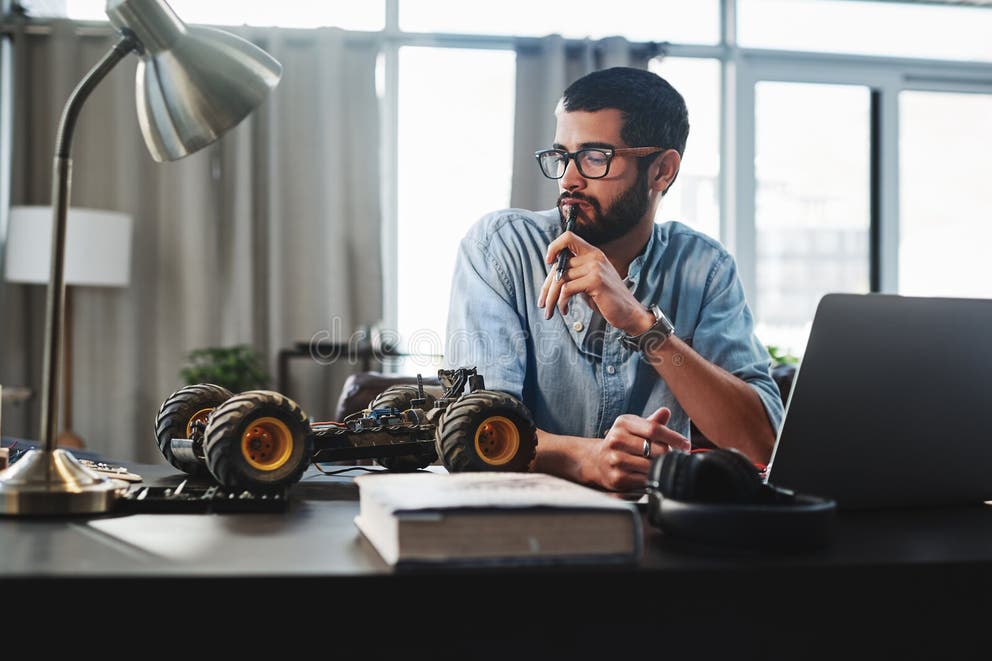 This Project is Quite Challenging. a Young Engineer Working from Home ...