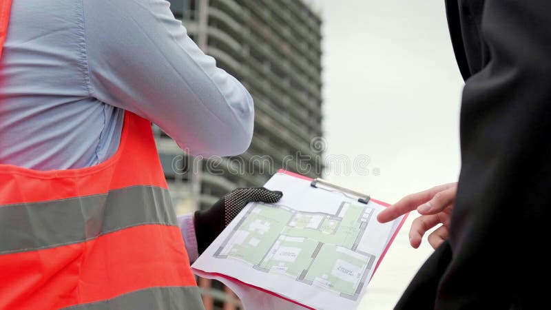 Project Team Conducting Inspection of Apartment Building Under ...
