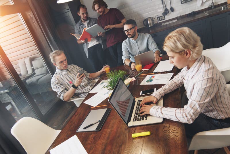Project Team Working Together in Kitchen Room. Teamwork at Home Stock ...