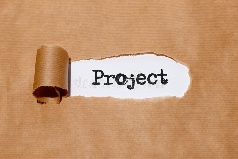 `Project` Written by Typewriter Behind Torn Paper Stock Photo - Image ...