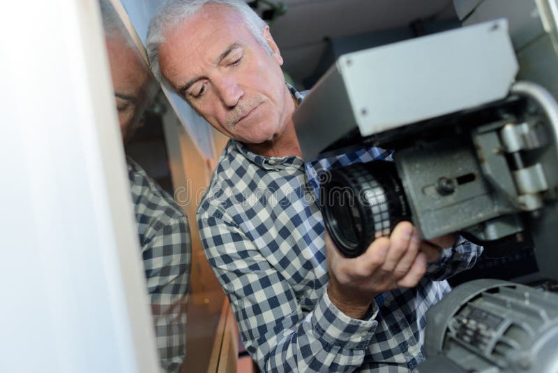 Projectionist at Work in Room Projectionist Stock Image - Image of ...