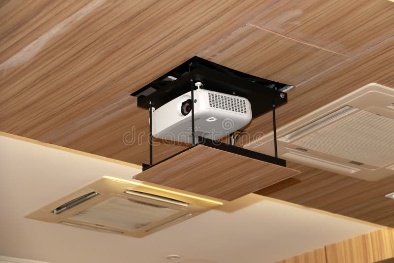 Projector Hanging on Ceiling of Meeting Room with All Lights Out Stock ...