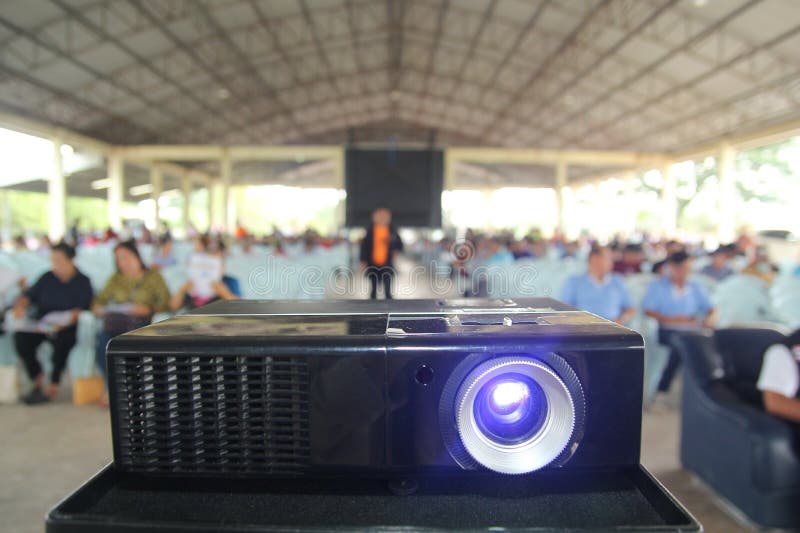 The Projector is Placed on a Table Covered with a White Cloth Pl Stock ...