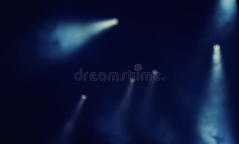 Projectors Light Beam through Smoke Stock Photo - Image of people ...