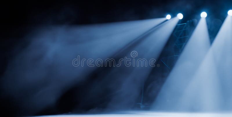 Projectors Light Beam through Smoke on Stage Stock Photo - Image of ...