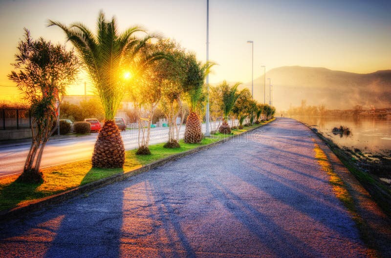 Promenade Along the River Bank at Warm Sunset Stock Photo - Image of ...