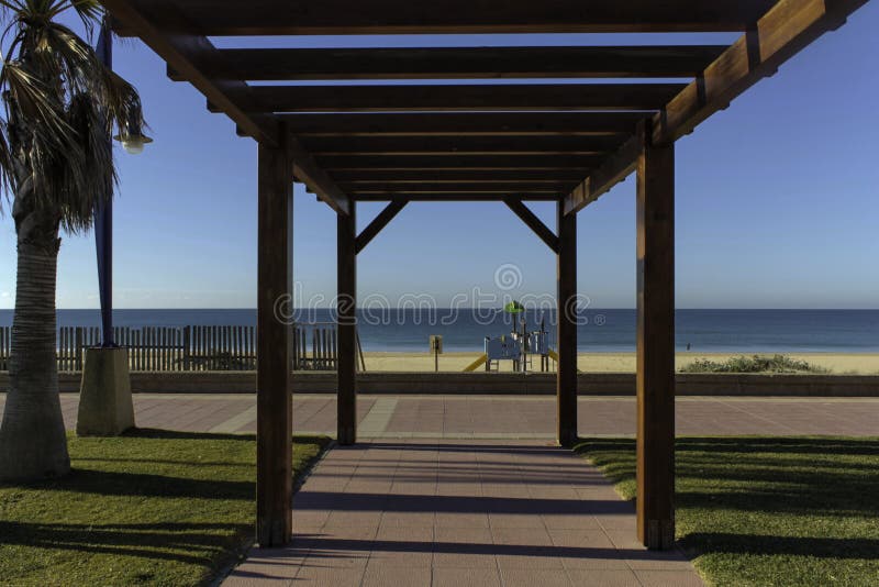 Promenade on the Beach with the Ocean in the Background Stock Image ...