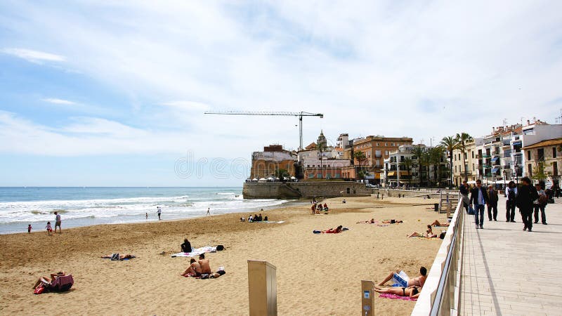 Promenade and Beach of Sitges with Church in the Background Editorial ...