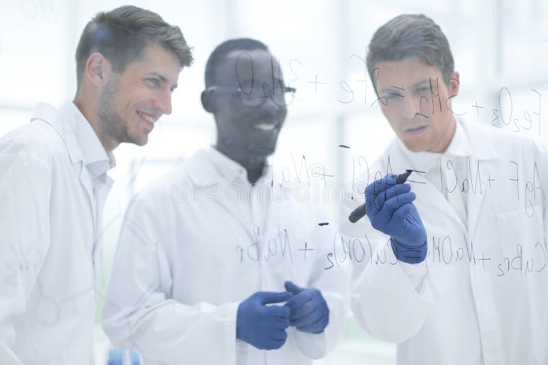 Promising Scientist Makes Notes on the Board Stock Photo - Image of ...