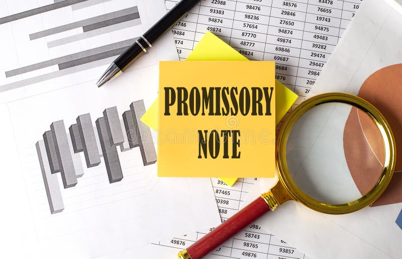 PROMISSORY NOTE Text on a Sticky on Red Notebook on Chart Background ...