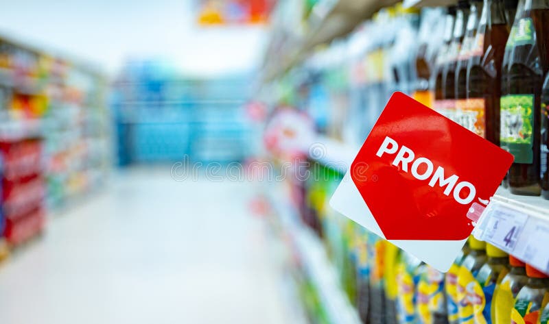 Promo Sign at a Shelf in a Supermarket Stock Photo - Image of grocery ...
