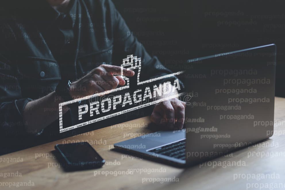 Propaganda Visual Concept. Man Points Finger at Propaganda Text Stock Photo - Image of ...