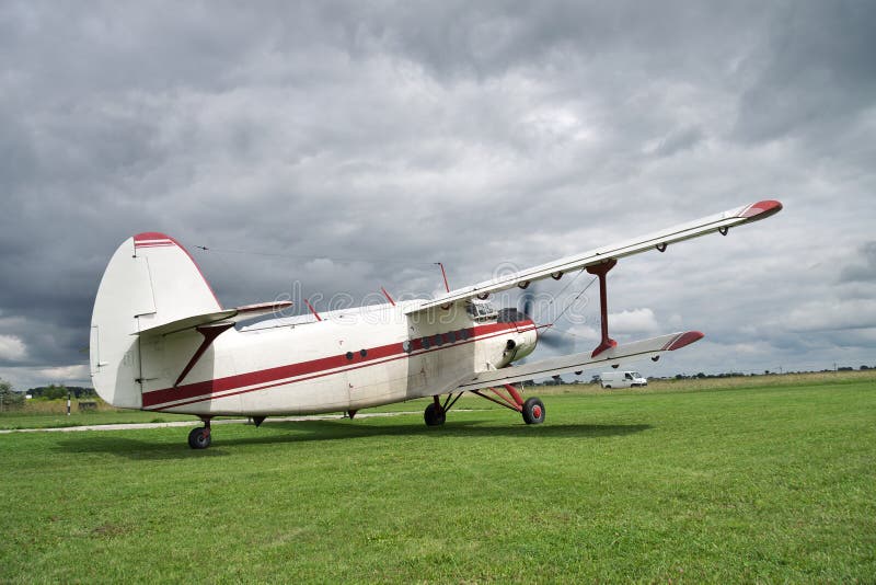 Old Biplane Takeoff Under the Storm Stock Image - Image of airstrip ...