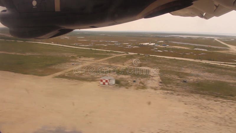 Propeller Plane Landing in Open Field Stock Video - Video of close ...