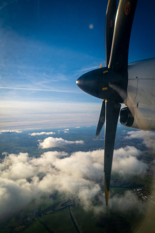 The Propeller of a Propeller Plane Flying Above the Clouds Stock Image ...