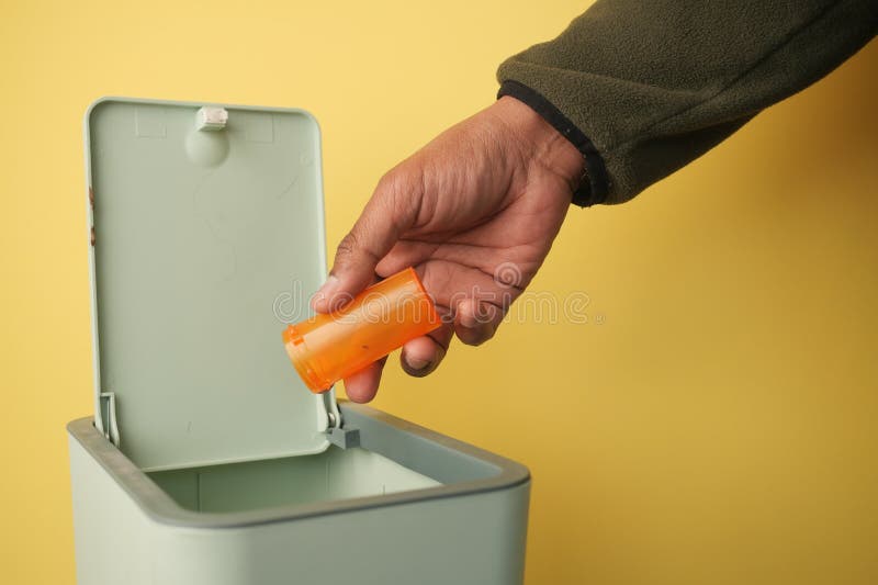Proper Disposal of Medication in a Recycling Bin Stock Photo - Image of ...