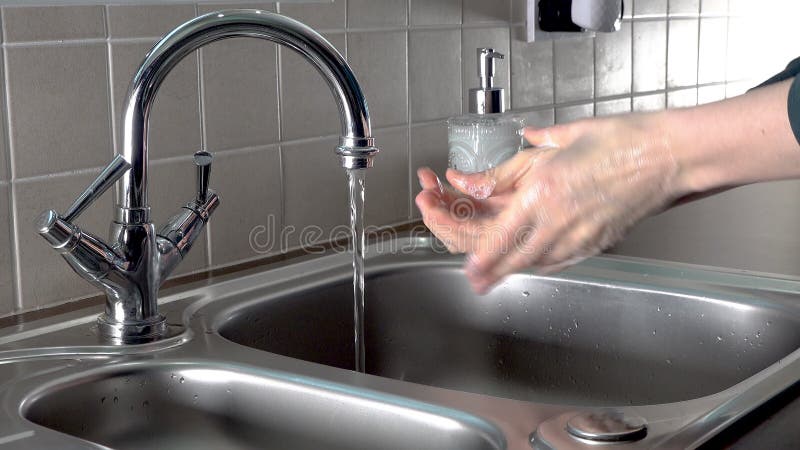 Proper Drying of Hands Demonstrated at Steel Kitchen Sink Stock Video ...