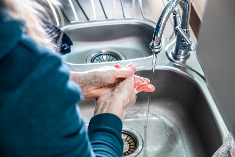 Proper Washing of Hands Demonstrated at Steel Kitchen Sink Stock Image ...
