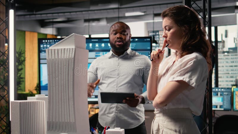 Property Development Team Evaluating 3D Models Structural Layout Stock ...