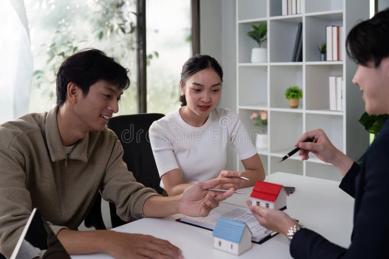 Property Features and Client Satisfaction. a Couple Discussing Home ...