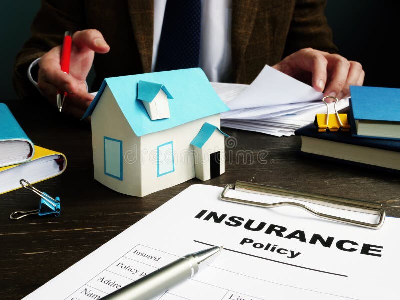Property Insurance Policy with Small Home and Agent Stock Image - Image ...