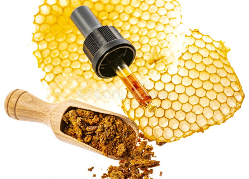 Propolis Tincture and a Wooden Spoon of Propolis Granules Stock Photo ...