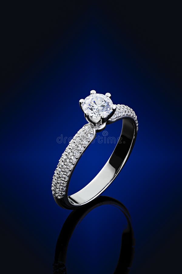 Proposal Diamonds Ring on Blue Background Stock Photo - Image of ...