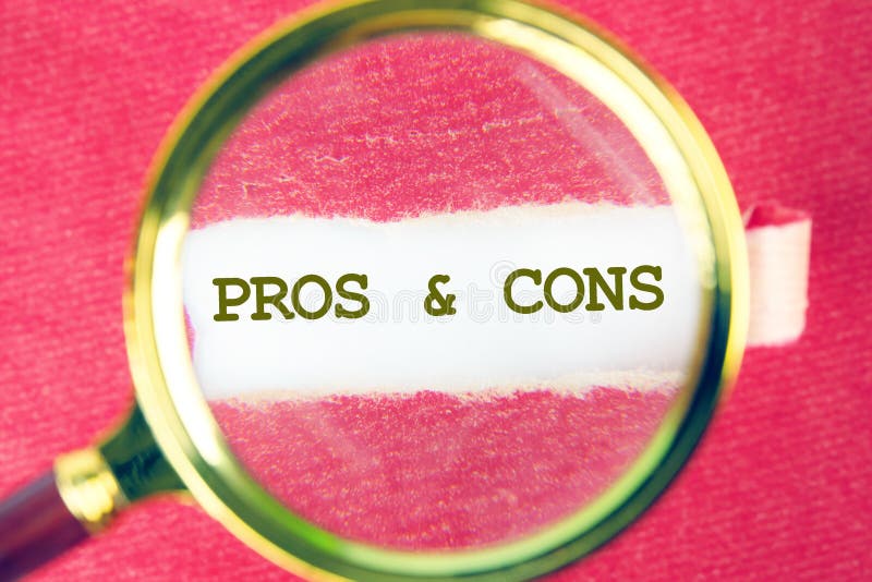 PROS and CONS Message on White Paper through a Magnifying Glass Under a ...