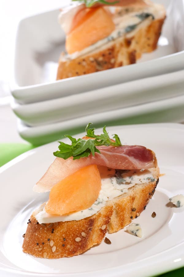 Prosciutto and Blue Cheese Canapes Stock Image - Image of cheese ...