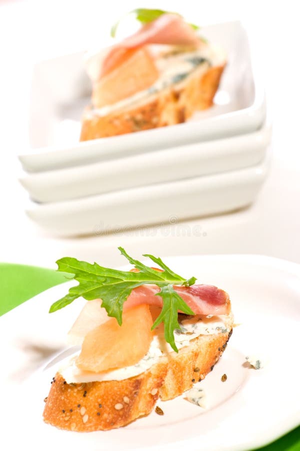 Prosciutto and Blue Cheese Canapes Stock Image - Image of savory, herbs ...