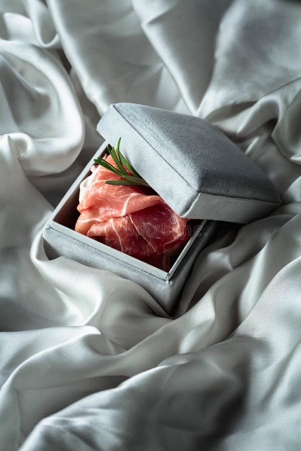 Prosciutto with Rosemary in a Gray Gift Box Stock Photo - Image of ...