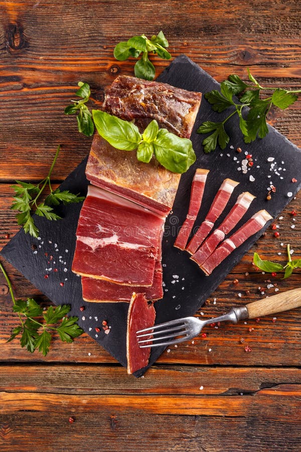 Prosciutto Sliced on Black Slate Stock Image - Image of breast, parma ...