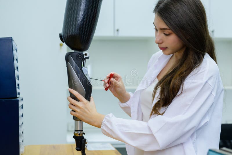 Prosthetic Technician Holding Prosthetic Leg Checking and Controlling ...
