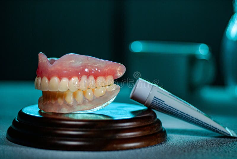 Prosthetics of False Teeth on a Dark Background Stock Photo - Image of ...