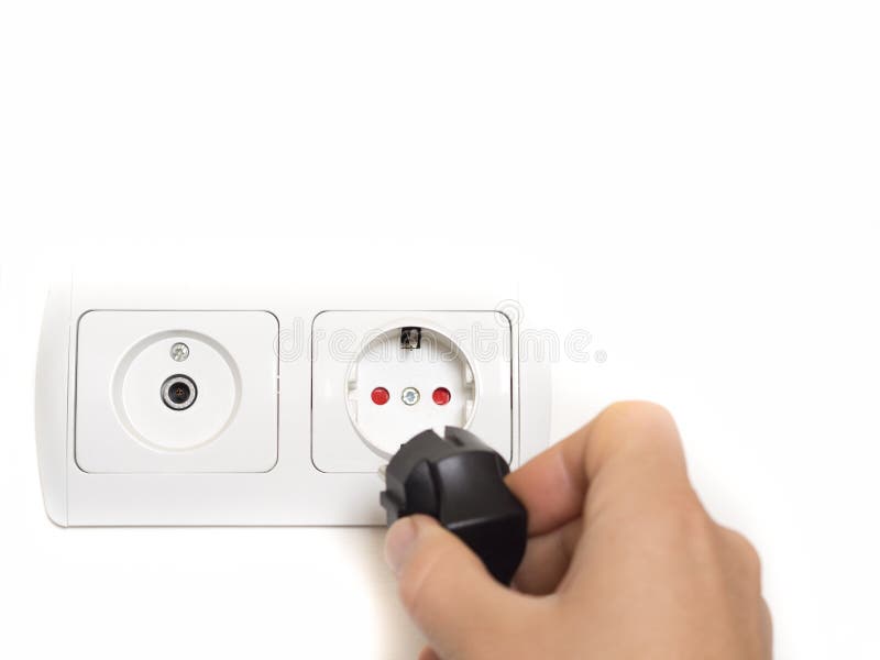 Protected Grounded Electrical Outlet on the Wall and Antenna Socket ...