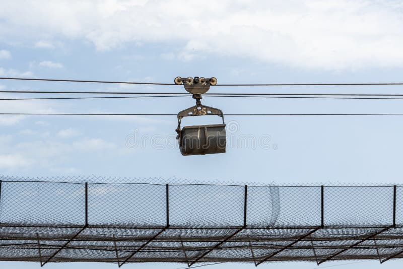 Aerial Cableway, Along Which Trolleys Move Empty and Loaded with Raw ...