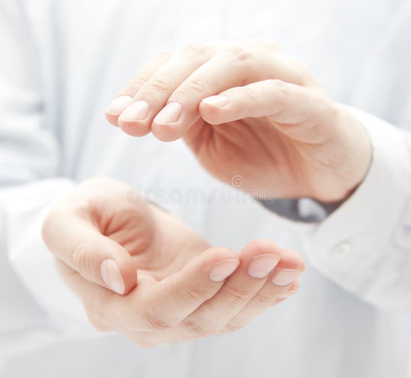 Protecting hands stock image. Image of businessman, close - 22042829