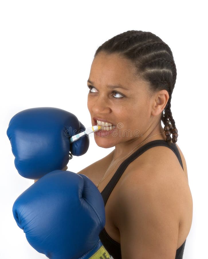 Female boxer brushing her teeth. Ebony boxing stock images, royalty ...
