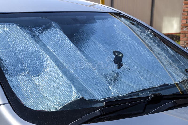 Protection of the Car Panel from Direct Sunlight. Sun Reflector Stock ...