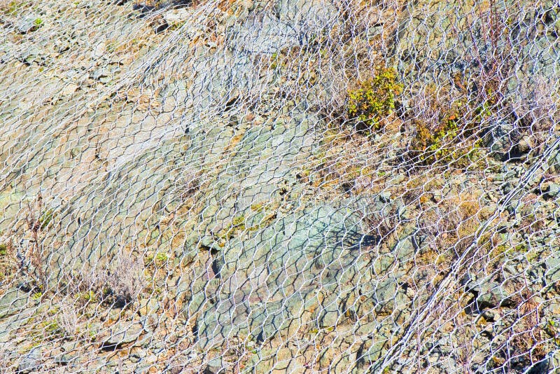 Protection Wire Mesh Against Falling Rocks From The Mountains Stock ...