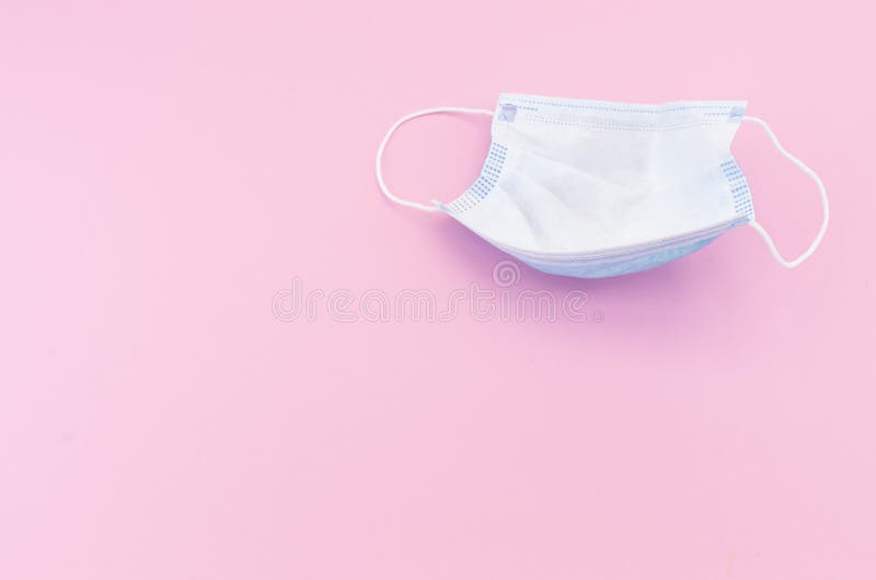 Back Side Medical Face Mask on a Pink Background from Above View Stock ...