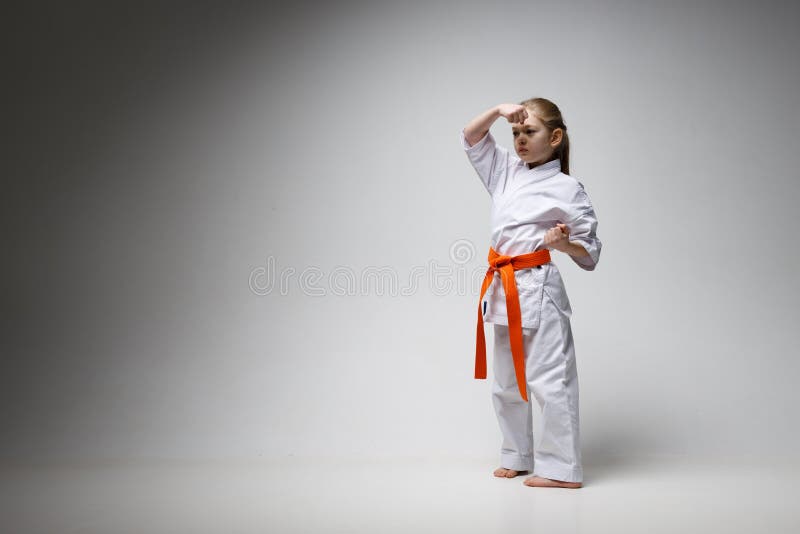 Protective Blocking in Karate. Strong Little Girl Training Stock Image ...