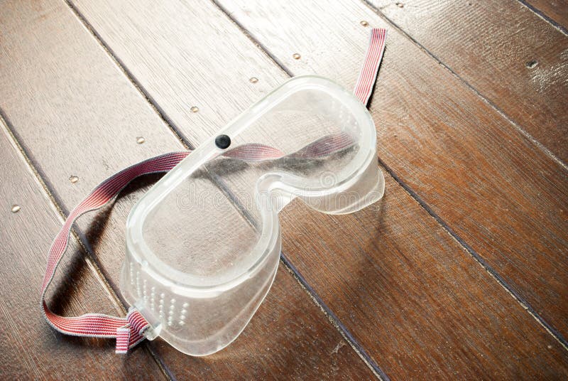Protective Eye Ware Goggles on a Wooden Background Stock Photo - Image ...
