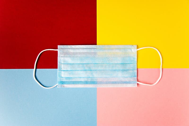 Protective Face Mask on a Colored Background Stock Photo - Image of ...
