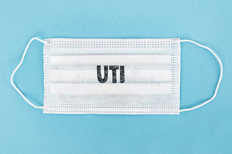 Protective Face Mask with UT Text Stock Photo - Image of bladder, note ...