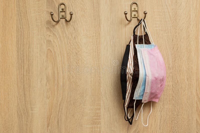 Protective Face Masks Hanging in the Hallway Stock Photo - Image of ...