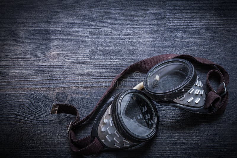 Protective Goggles on Vintage Wood Board Stock Image - Image of black ...