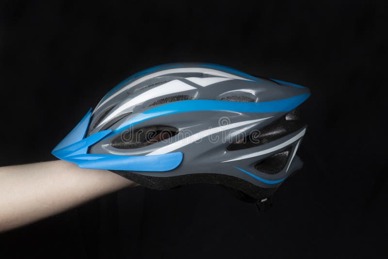 A Protective Helmet for a Cyclist.Head Protection while Cycling Stock ...