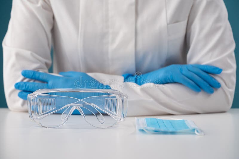 Protective Mask and Plastic Glasses for the Safety of the Doctor when ...